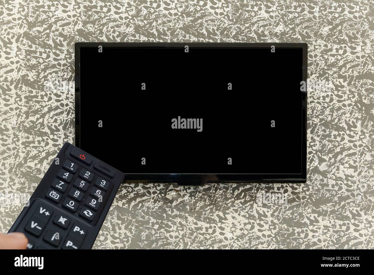 Led tv with remote hi-res stock photography and images - Alamy