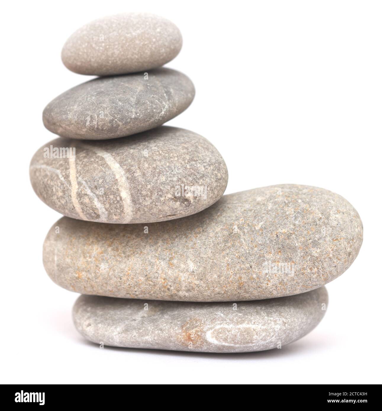 Balancing stones isolated on white background Stock Photo - Alamy