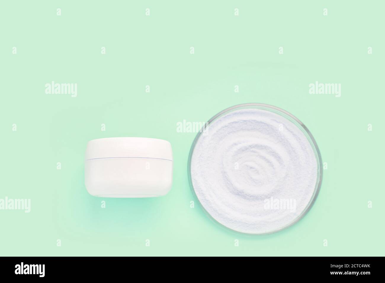 Collagen white powder. Pastel color background. Health product Stock ...