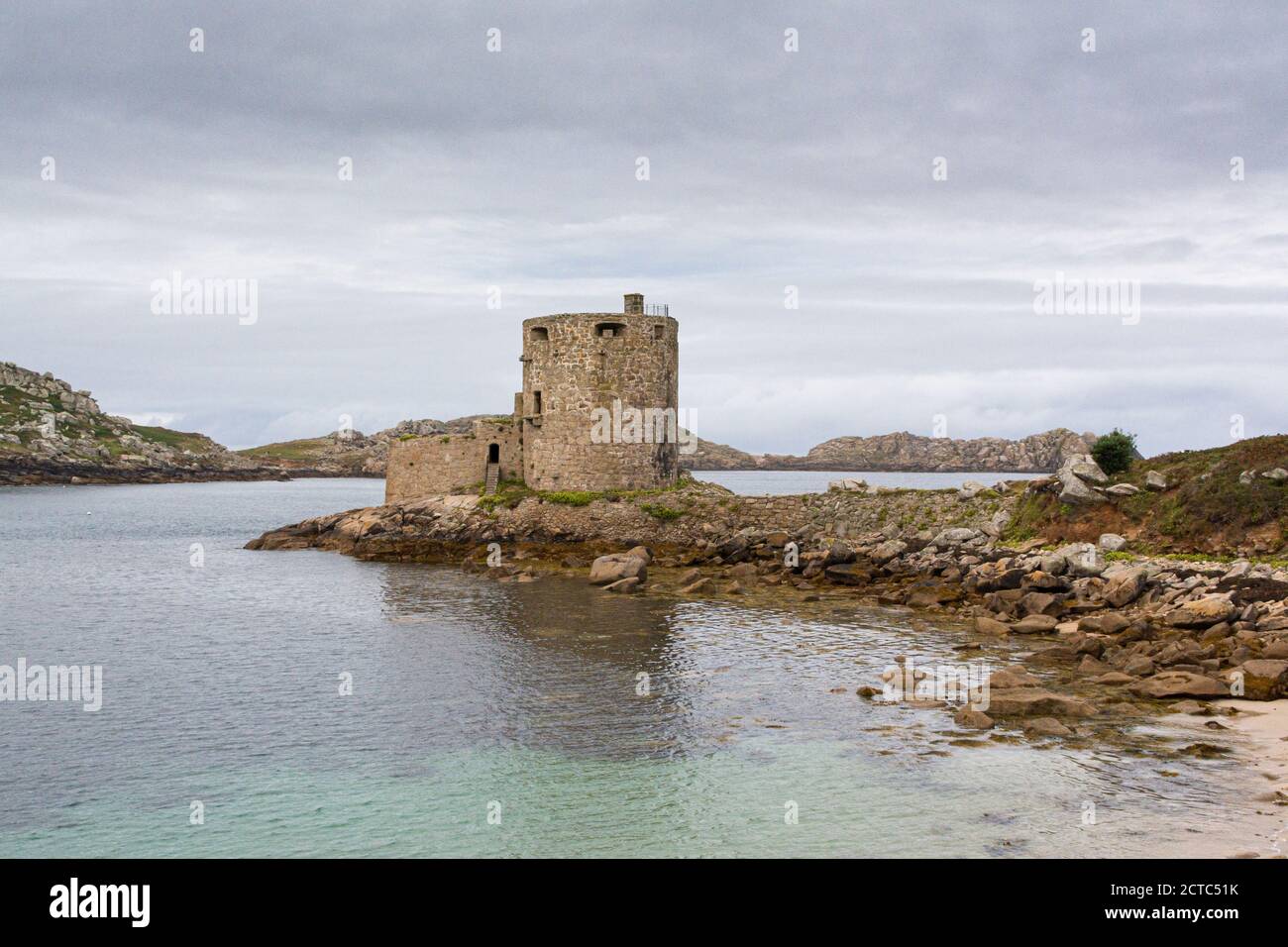 Cromwell's Castle on Tresco, Isles of Scilly with Bryher in the ...