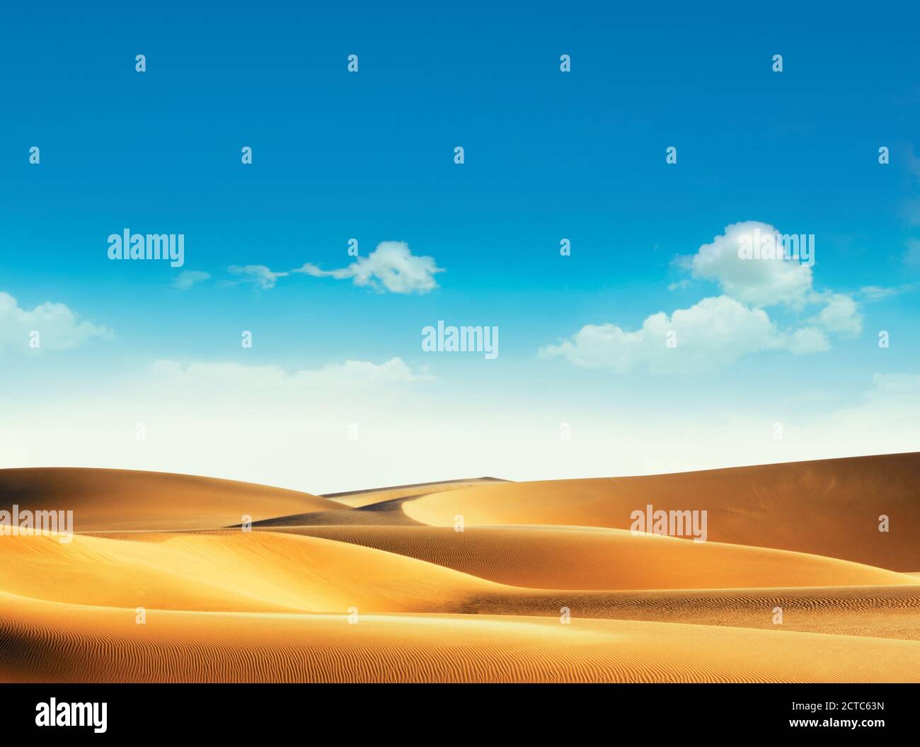 Desert landscape and blue sky with clouds Stock Photo - Alamy