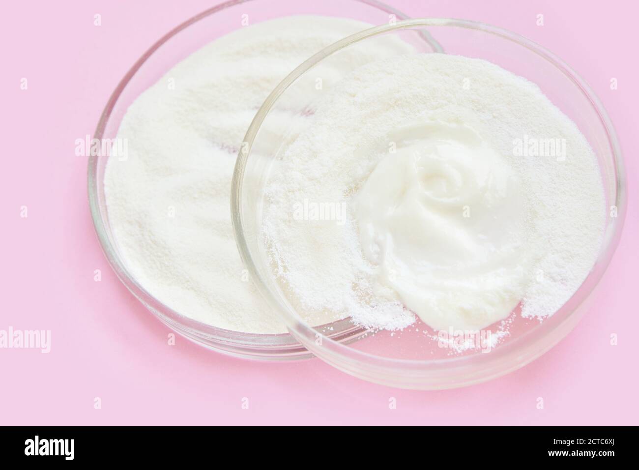 Collagen white powder. Pastel color background. Health product Stock ...