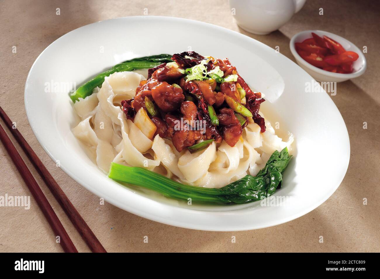 Asian cuisine traditional Shanxi sliced noodles Stock Photo - Alamy