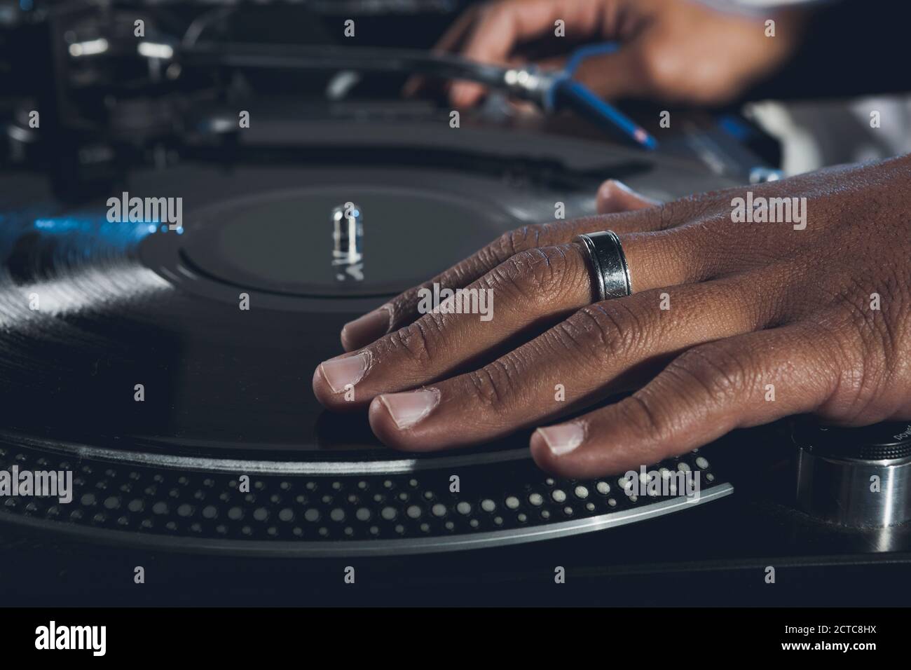 Dj mixes the track in the nightclub Stock Photo - Alamy