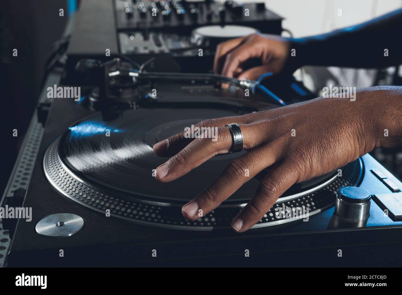 Dj mixes the track in the nightclub Stock Photo - Alamy