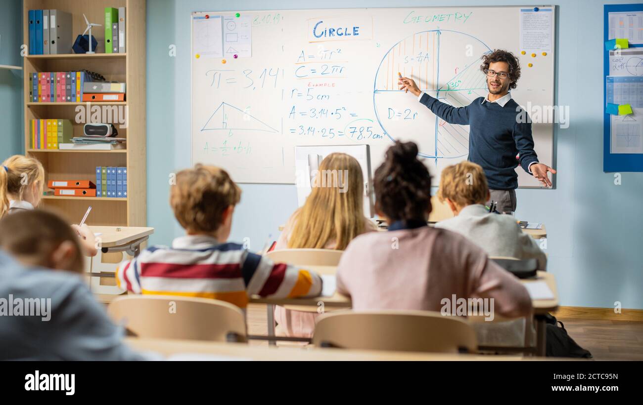 Enthusiastic Teacher Explains Lessons and Asks Questions from a ...