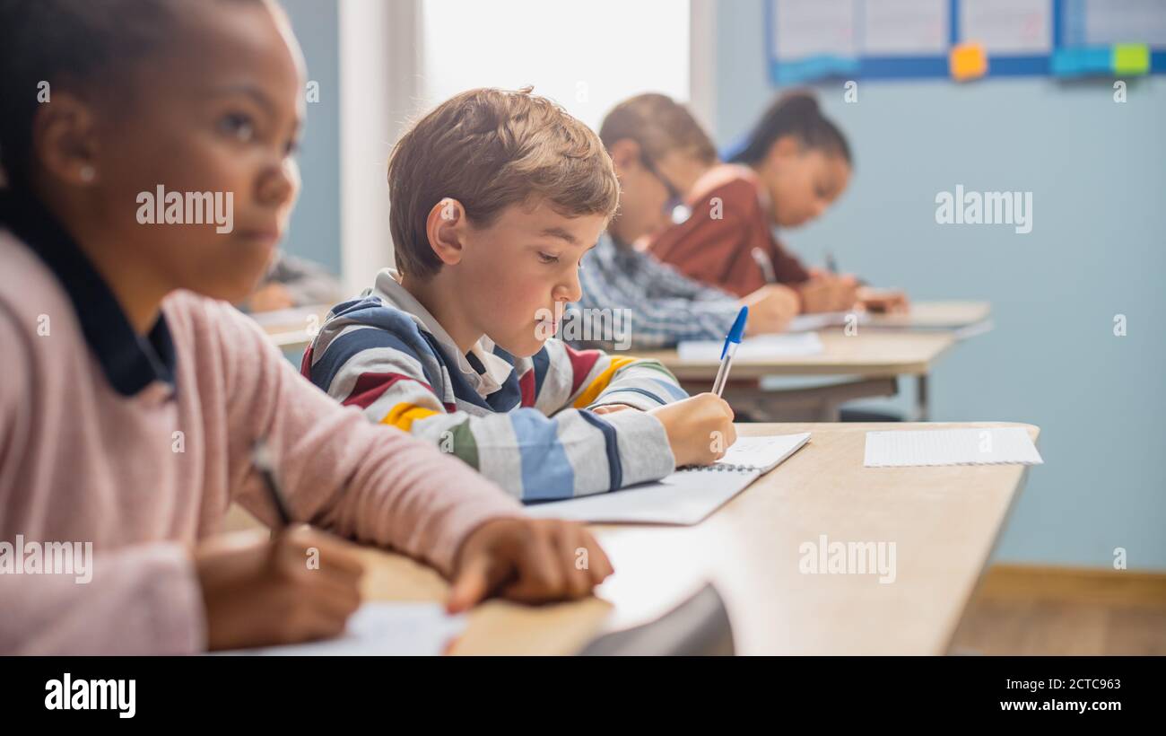 Students writing test diverse hi-res stock photography and images - Alamy
