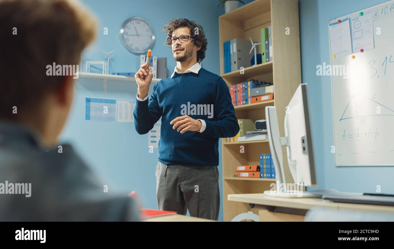 Enthusiastic Teacher Explains Lesson to a Classroom Full of Bright ...