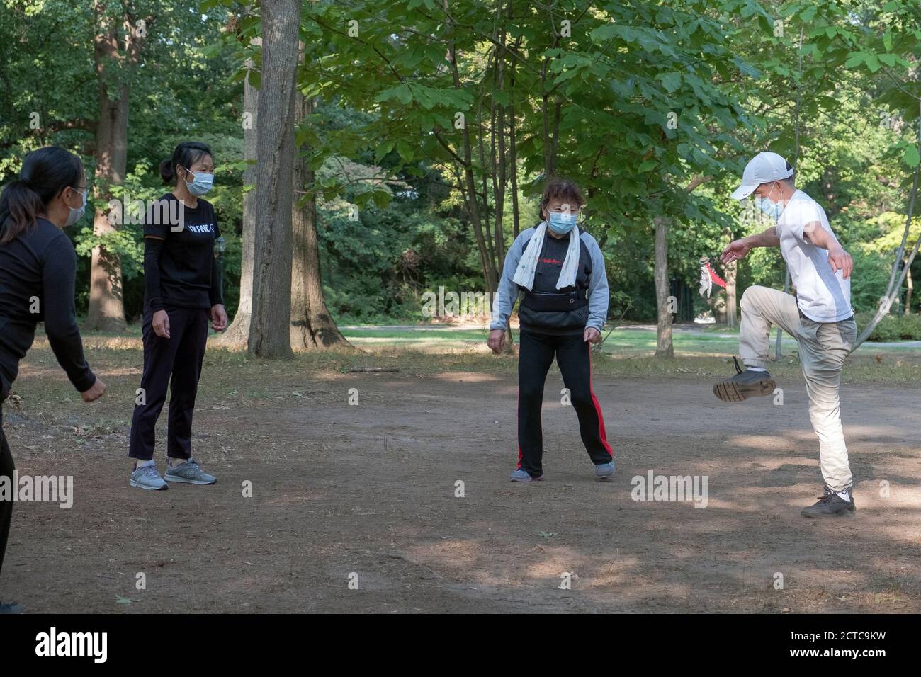 4 Chinese American New Yorkers play Jianzi, a game where the object is ...