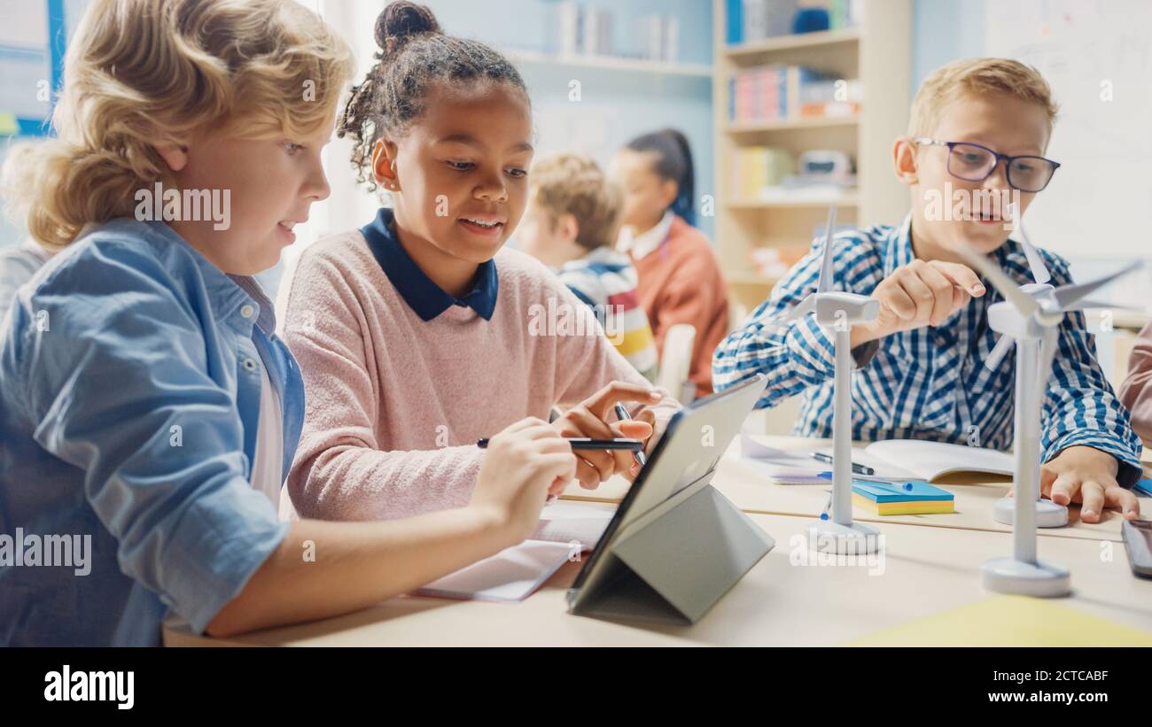 In the Elementary School: Class of Smart Young Children Work as a Team ...