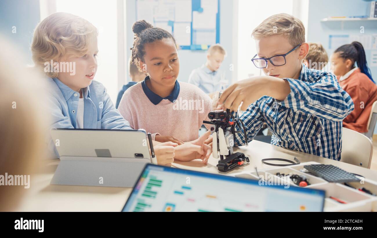 Elementary School Robotics Classroom: Diverse Group of Children ...