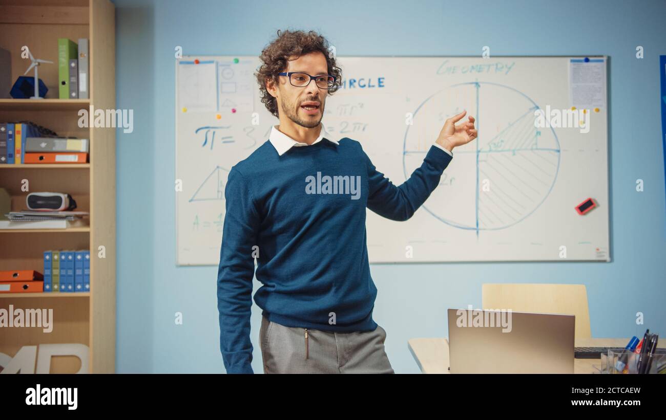 Portrait of Teacher Explaining Lesson to Classroom Full of Diverse ...