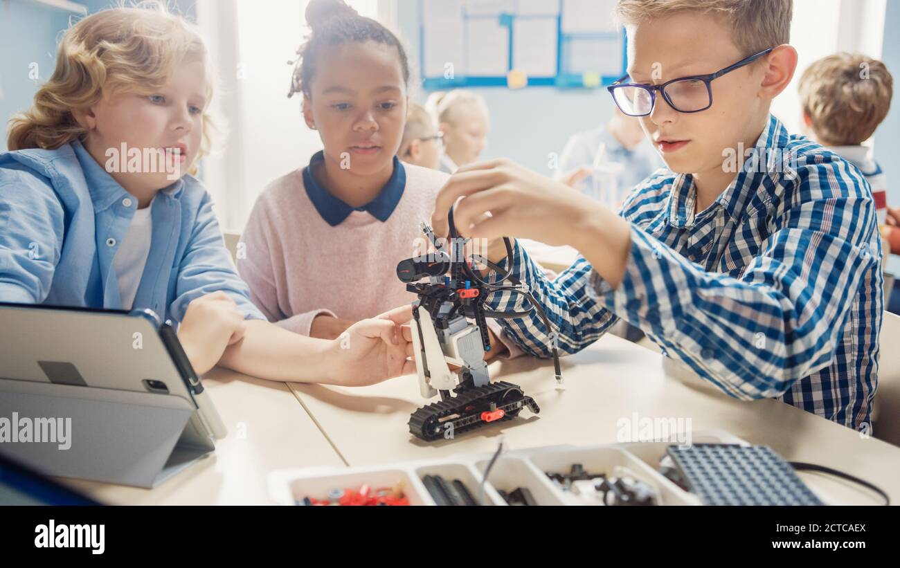 Elementary School Robotics Classroom: Diverse Group of Children ...