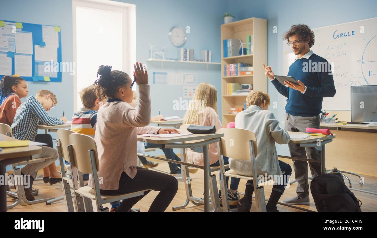 Caring teacher hi-res stock photography and images - Alamy