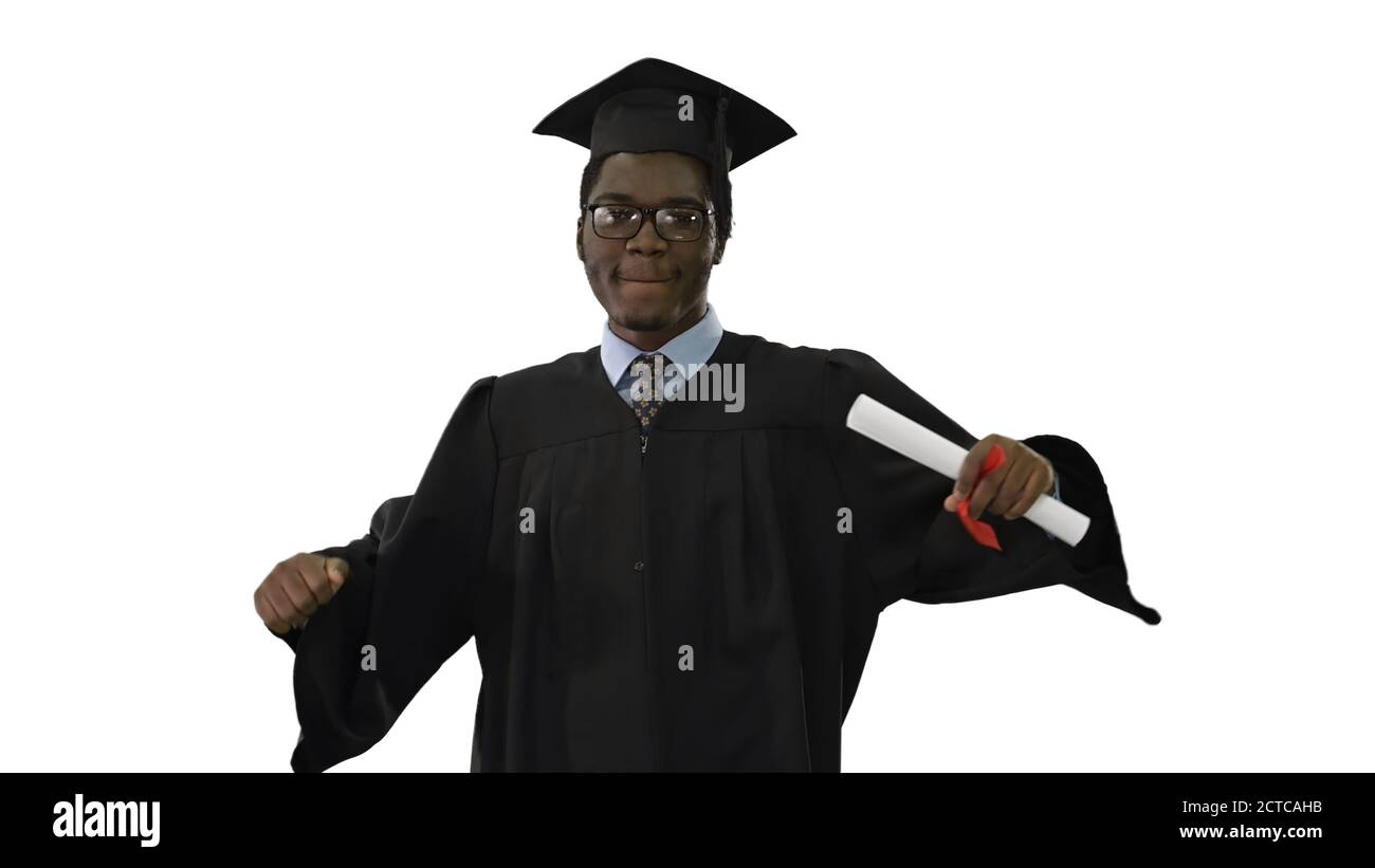 Excited african american male student in graduation robe dancing Stock ...