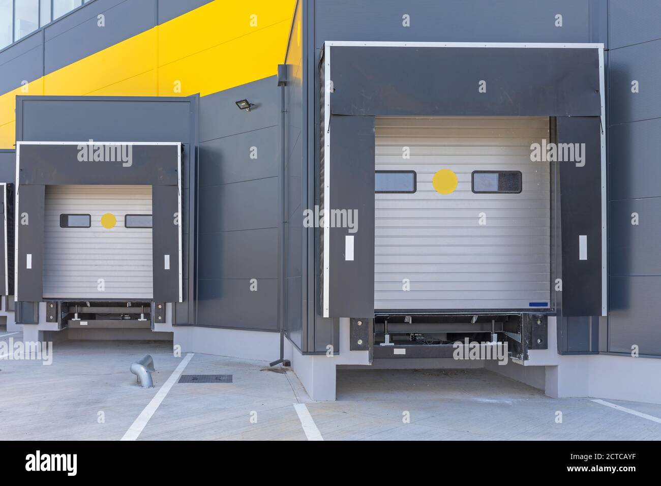 Loading Bay Cargo Doors at Distribution Warehouse Stock Photo - Alamy