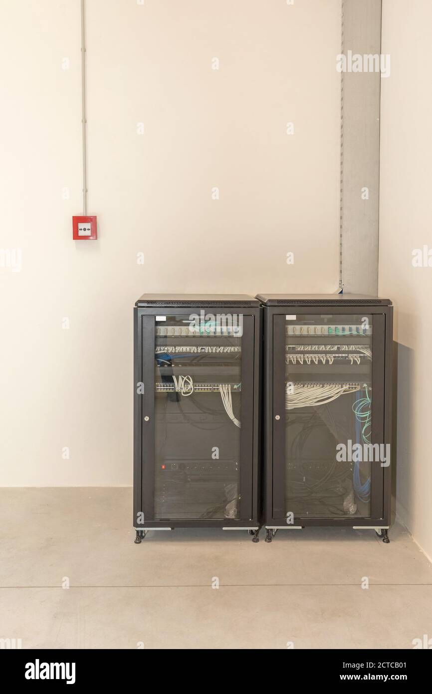 Two Server Racks Enclosures and Network Cabinets in Room Stock Photo ...