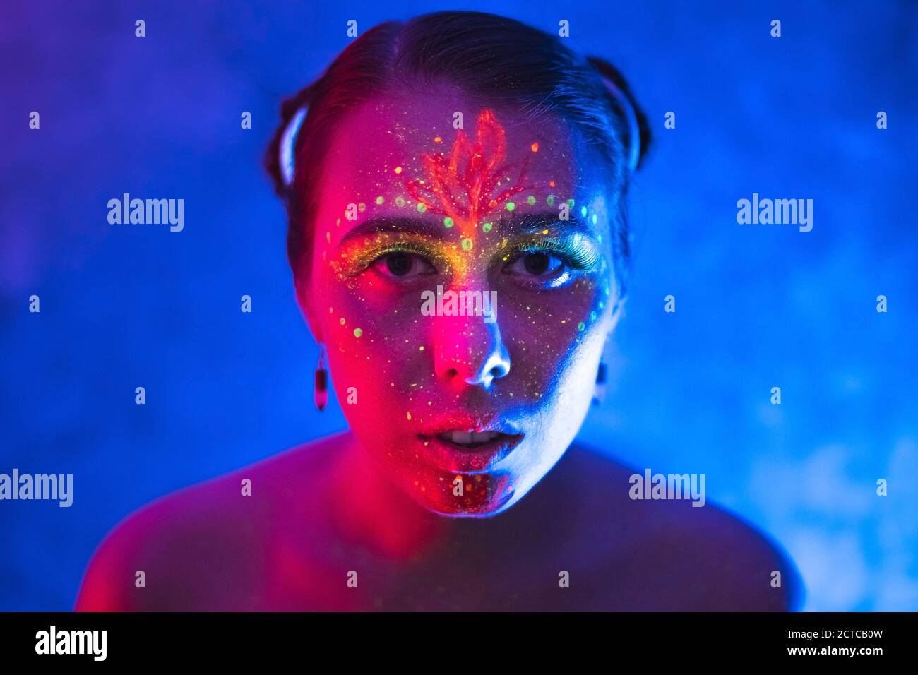 Uv body art hi-res stock photography and images - Alamy