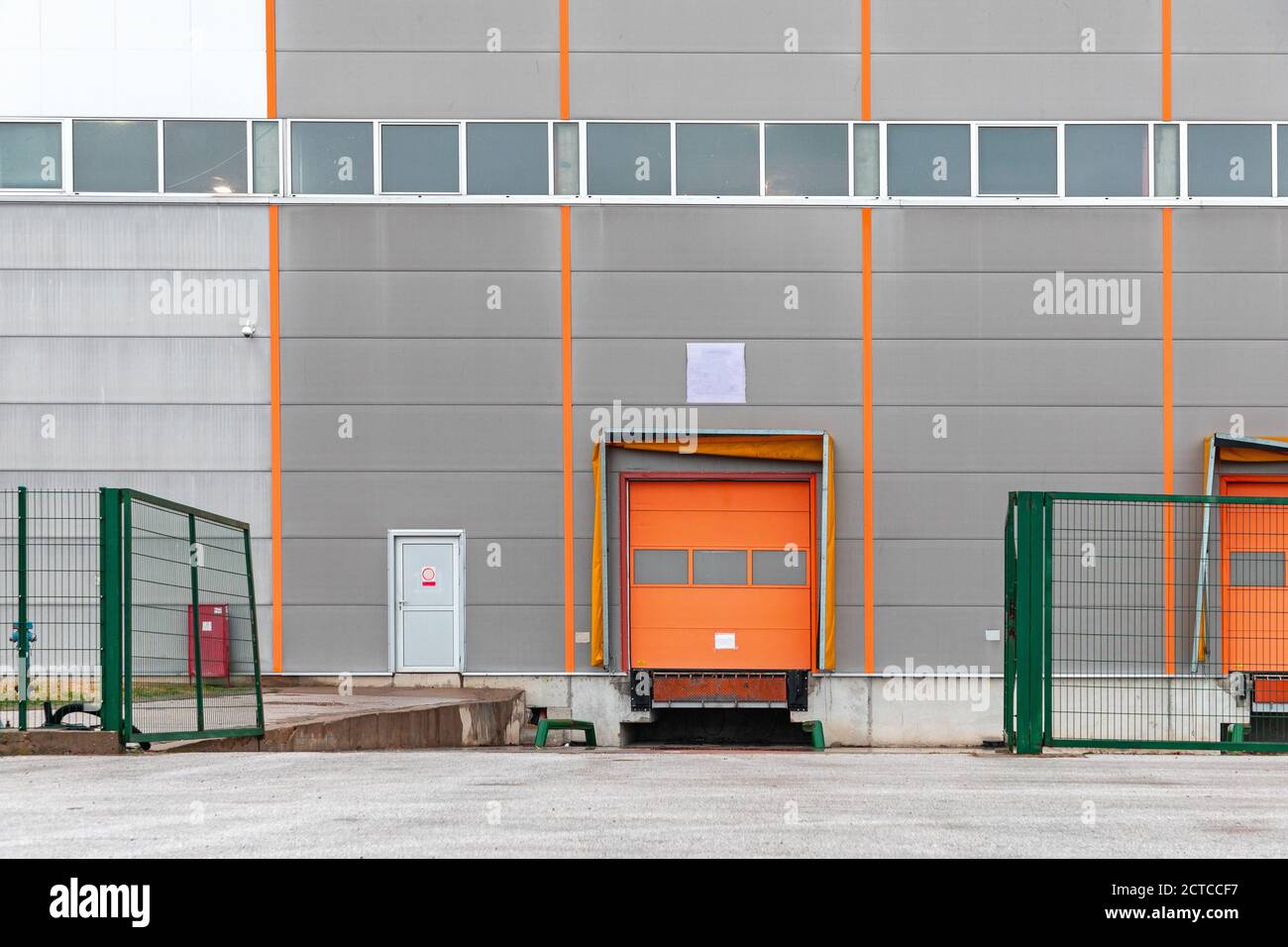 Loading Cargo Dock Doors at Distribution Warehouse Stock Photo - Alamy
