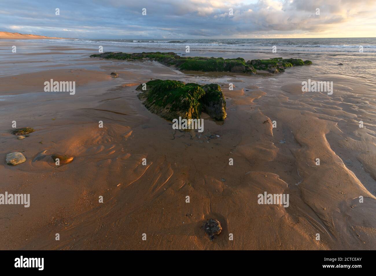 Beautiful sunset at the atlantic coast in France Stock Photo - Alamy