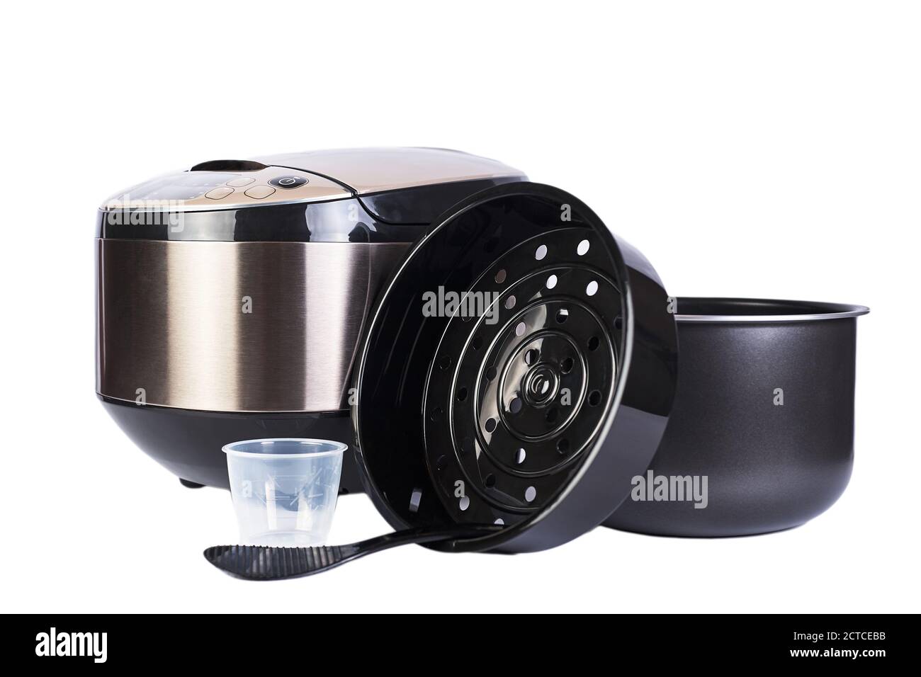 Automatic multicooker and accessories set isolated on a white ...