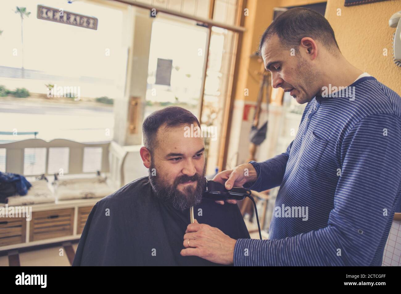 Barbering man hi-res stock photography and images - Alamy