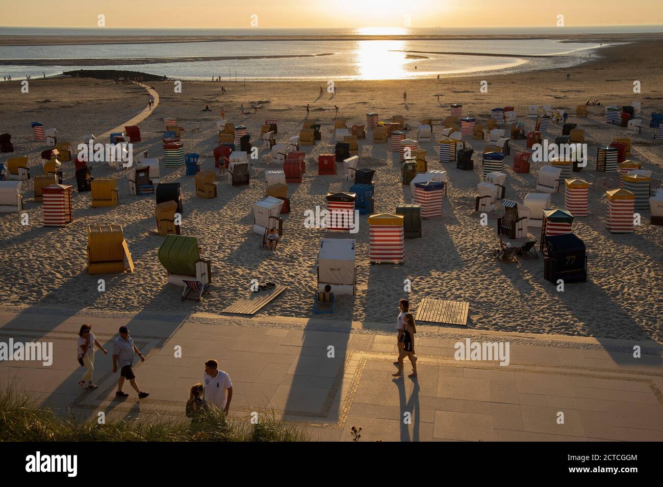 View of beach and promenade at sunset time on Borkum Island, Frisia ...