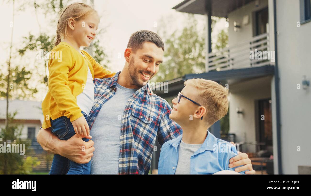 Portrait of a Happy Family of Three: Father, Daughter, Son. They Are ...
