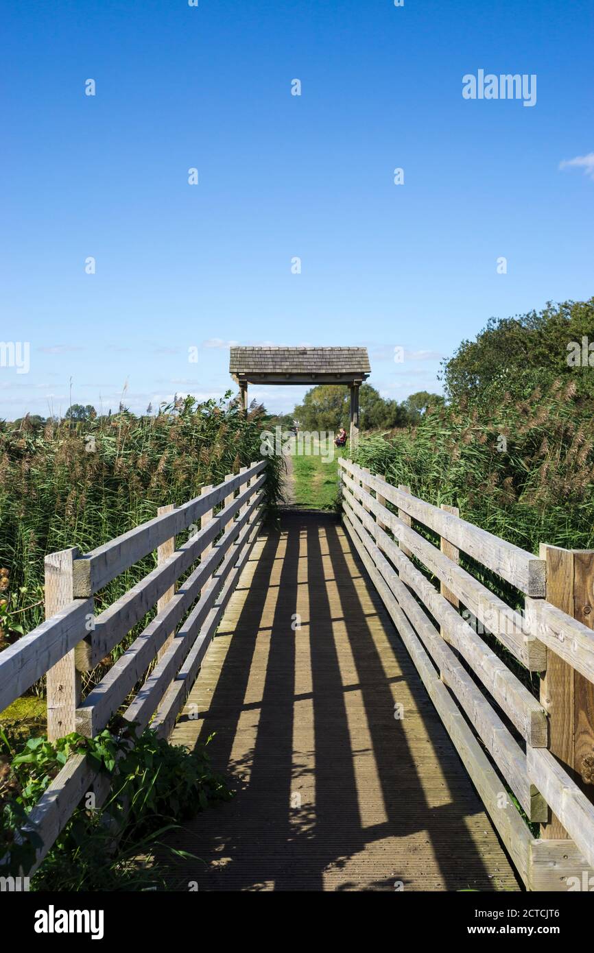 Footbridge over drainage ditch roofed entrance Stock Photo - Alamy