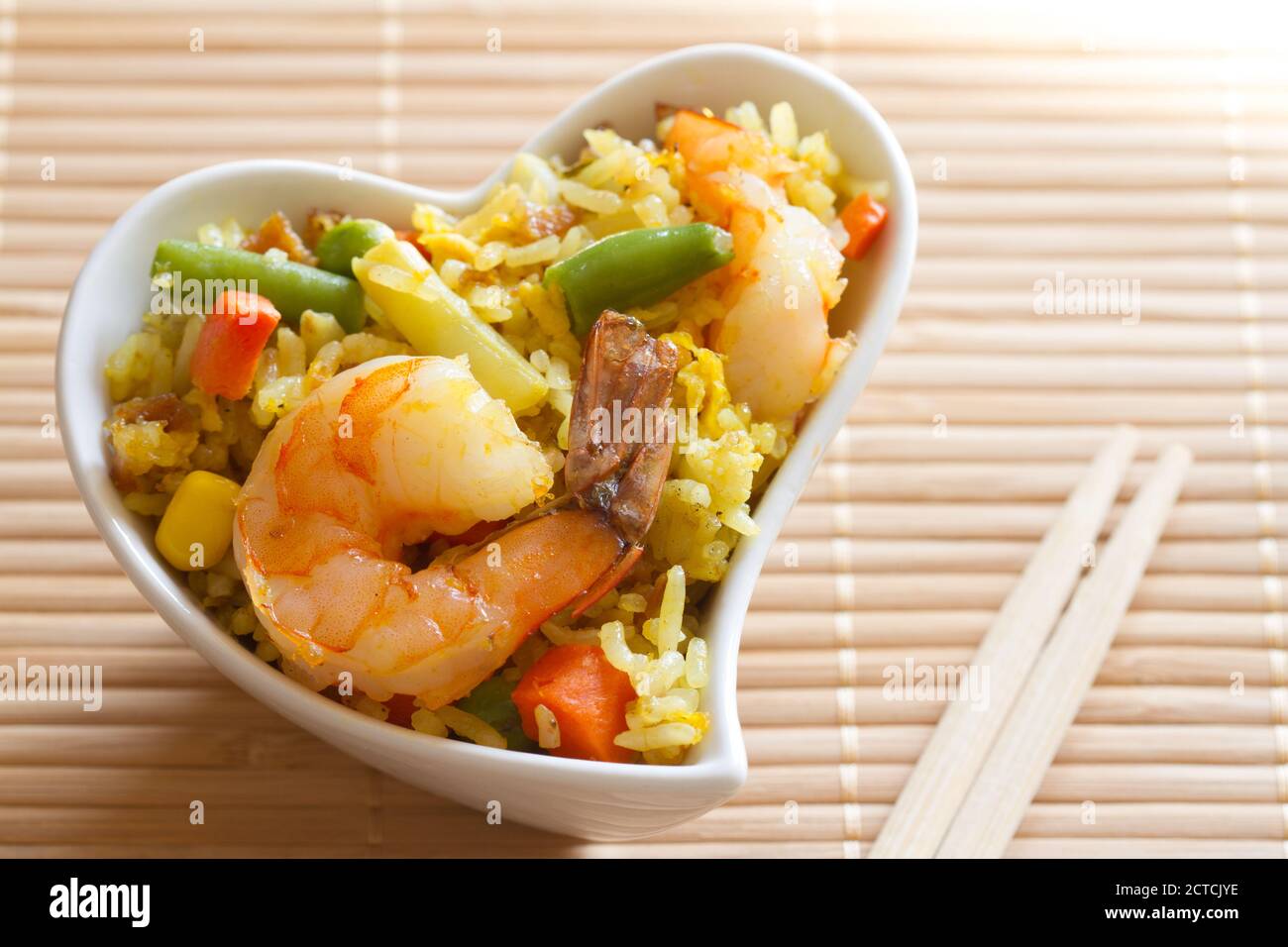 Asian dish in heart-shaped bowl, love asian food menu concept Stock ...