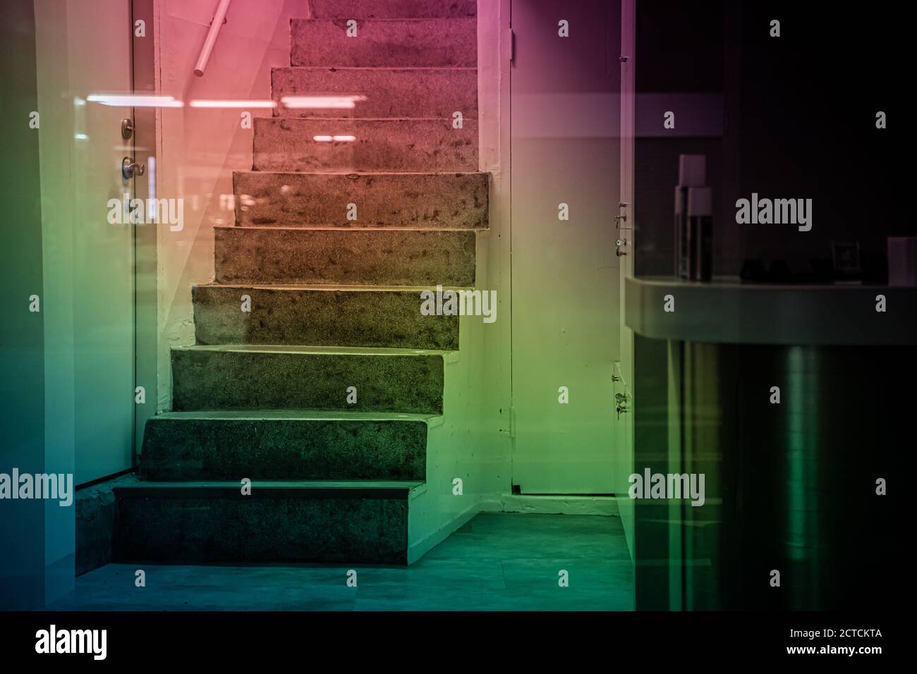 A upstairs with rainbow-like lights, symbols a growing strength of ...