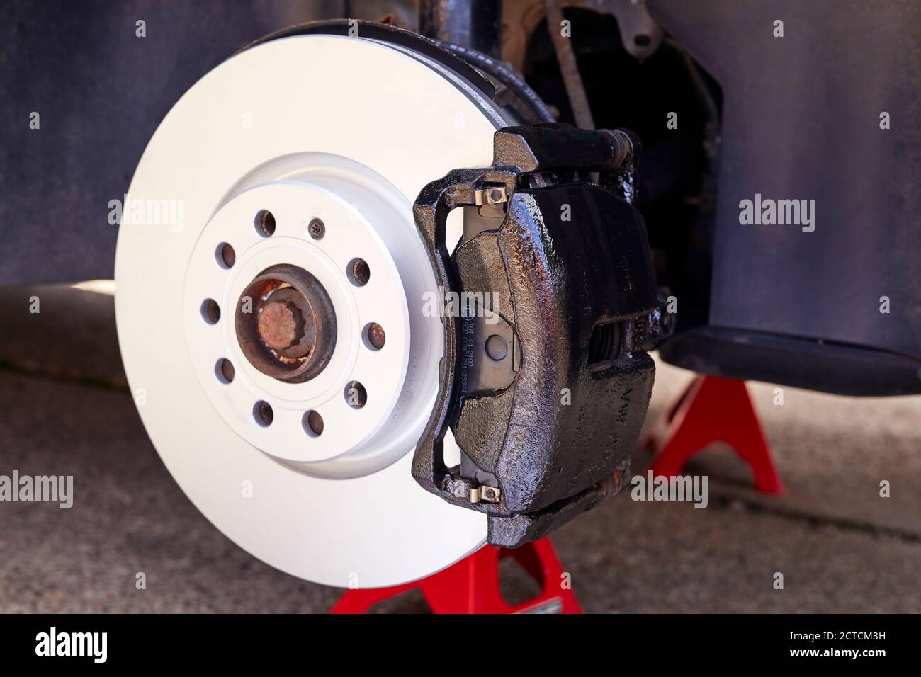 New set of brake discs fitted to vehicle Stock Photo - Alamy