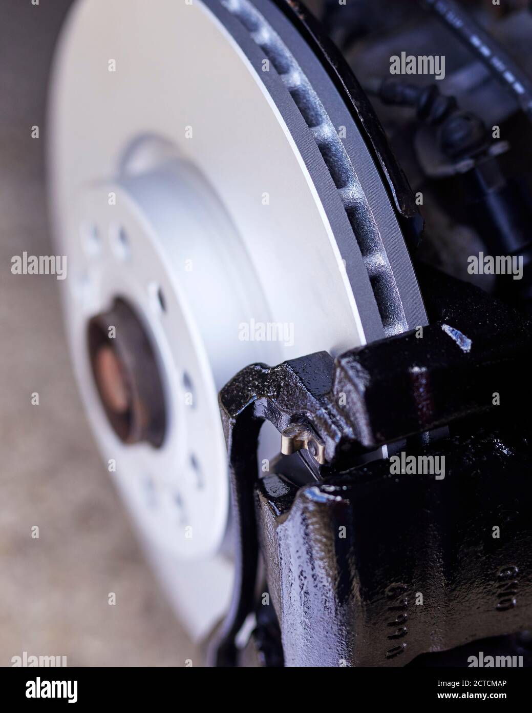 New set of brake discs fitted to vehicle Stock Photo - Alamy