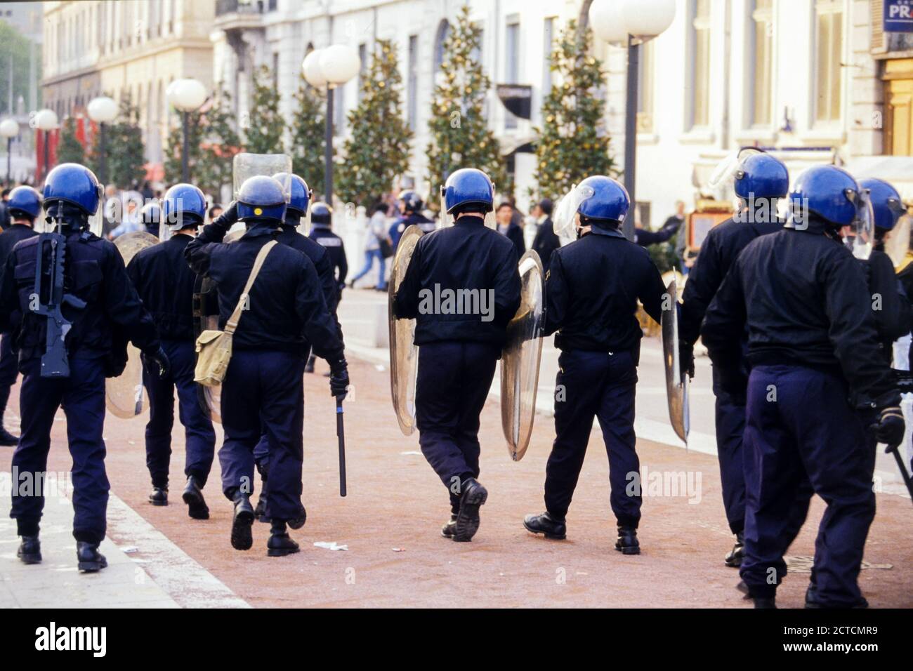 French riot police forces face young protesters demonstrating against ...