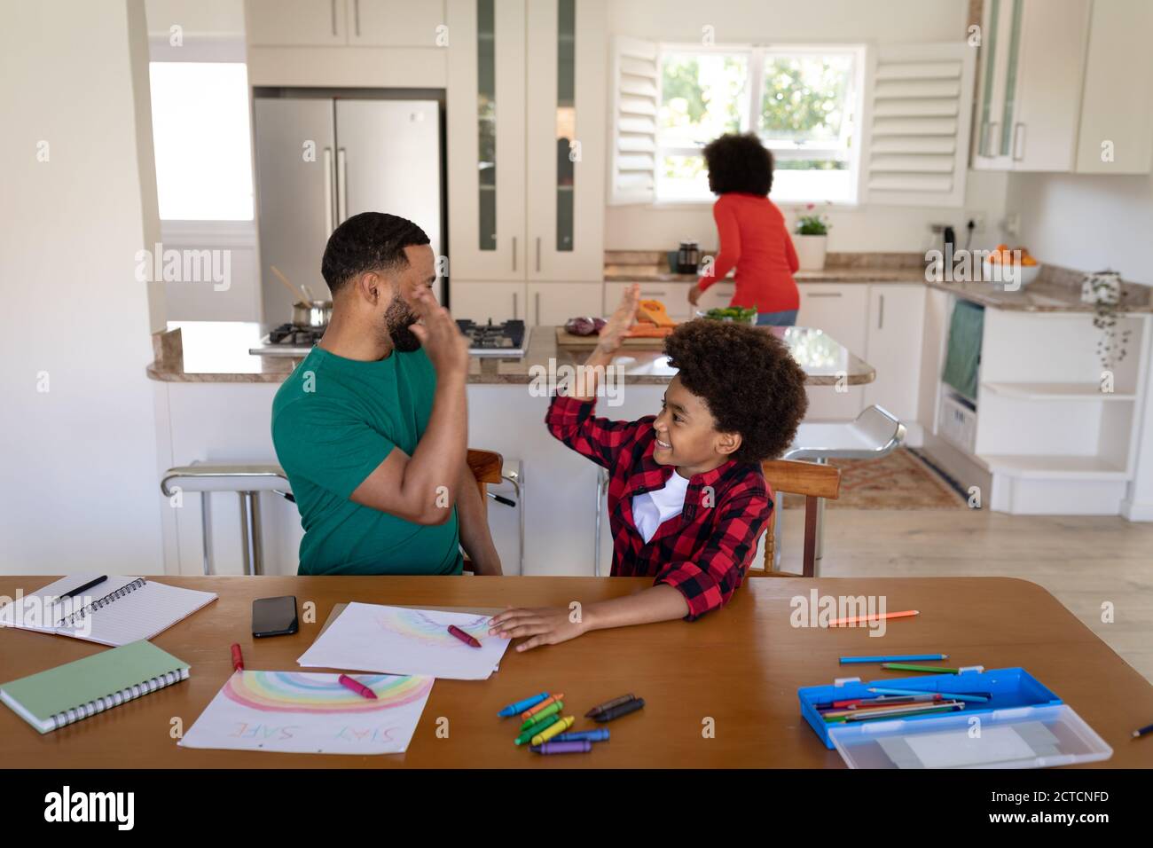 High fiving each other hi-res stock photography and images - Alamy