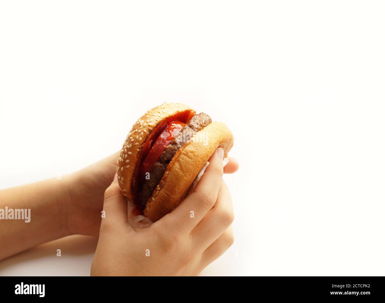 Hands holding burger hi-res stock photography and images - Alamy