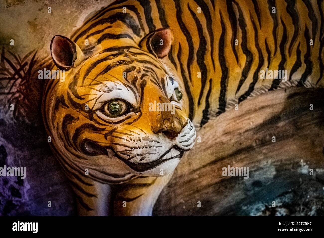 A stereoscopic tiger on a wall of a temple, which is a tiger in ...