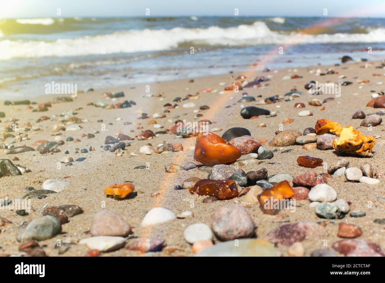 Amber on beach baltic sea hi-res stock photography and images - Alamy