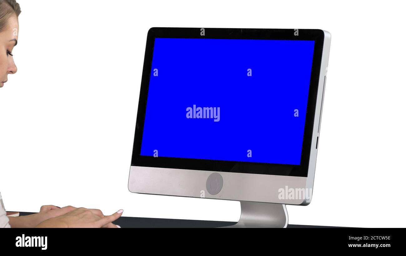 Woman using computer, white background. Blue Screen Mock-up Disp Stock ...