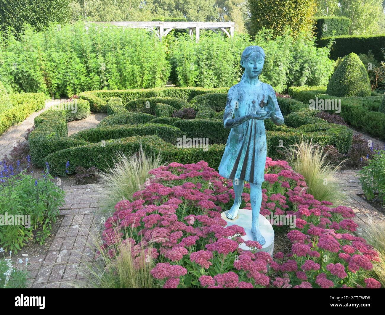 Statue of a girl holding the 'Lamp of Wisdom' in the Silent Space ...