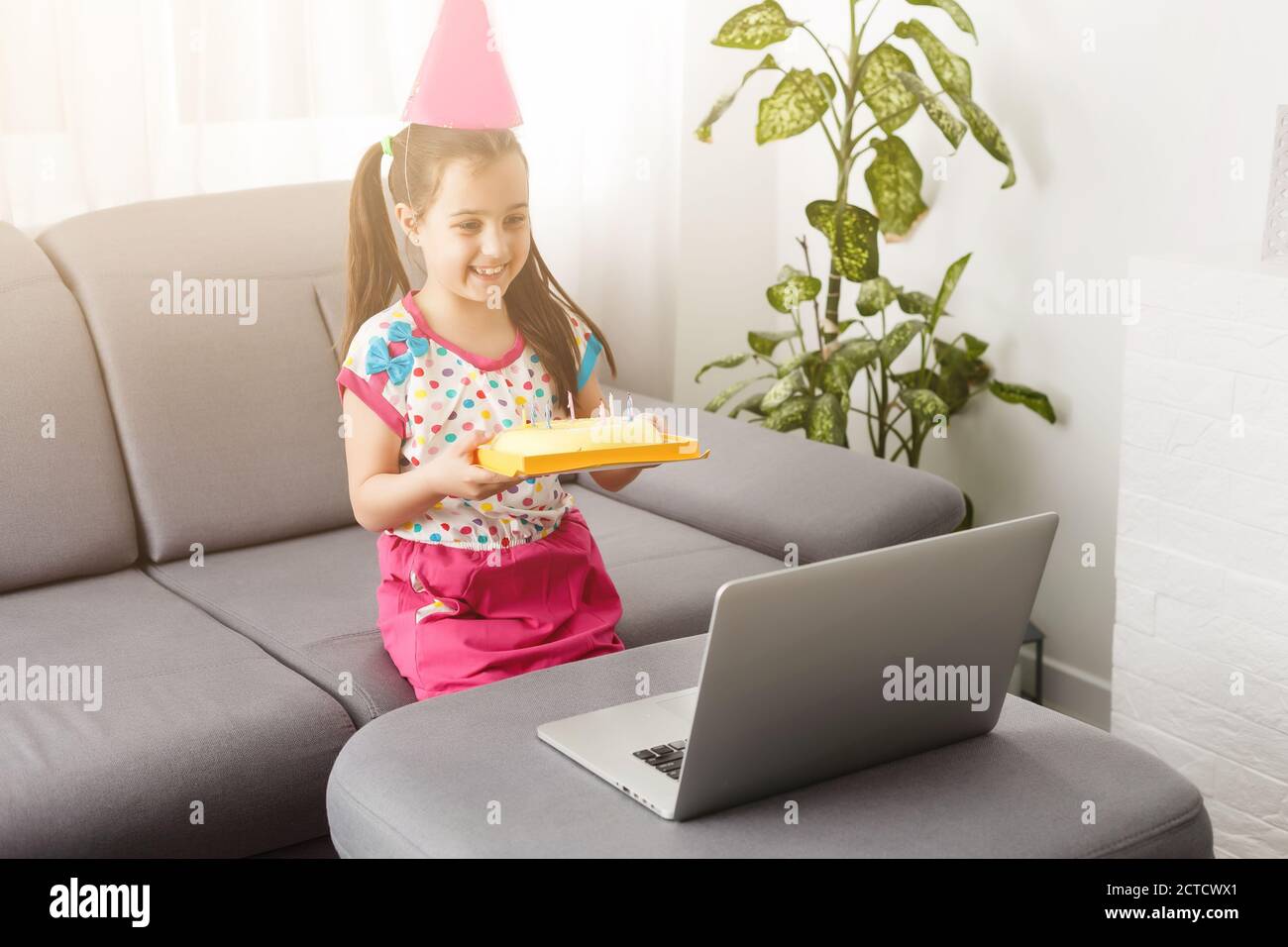 Children virtual birthday party with cake online together with her ...
