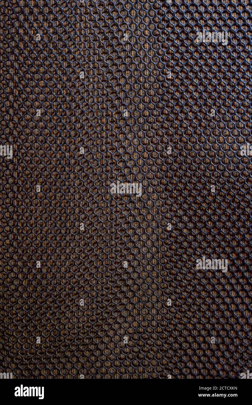 Plastic net on a wall Stock Photo - Alamy