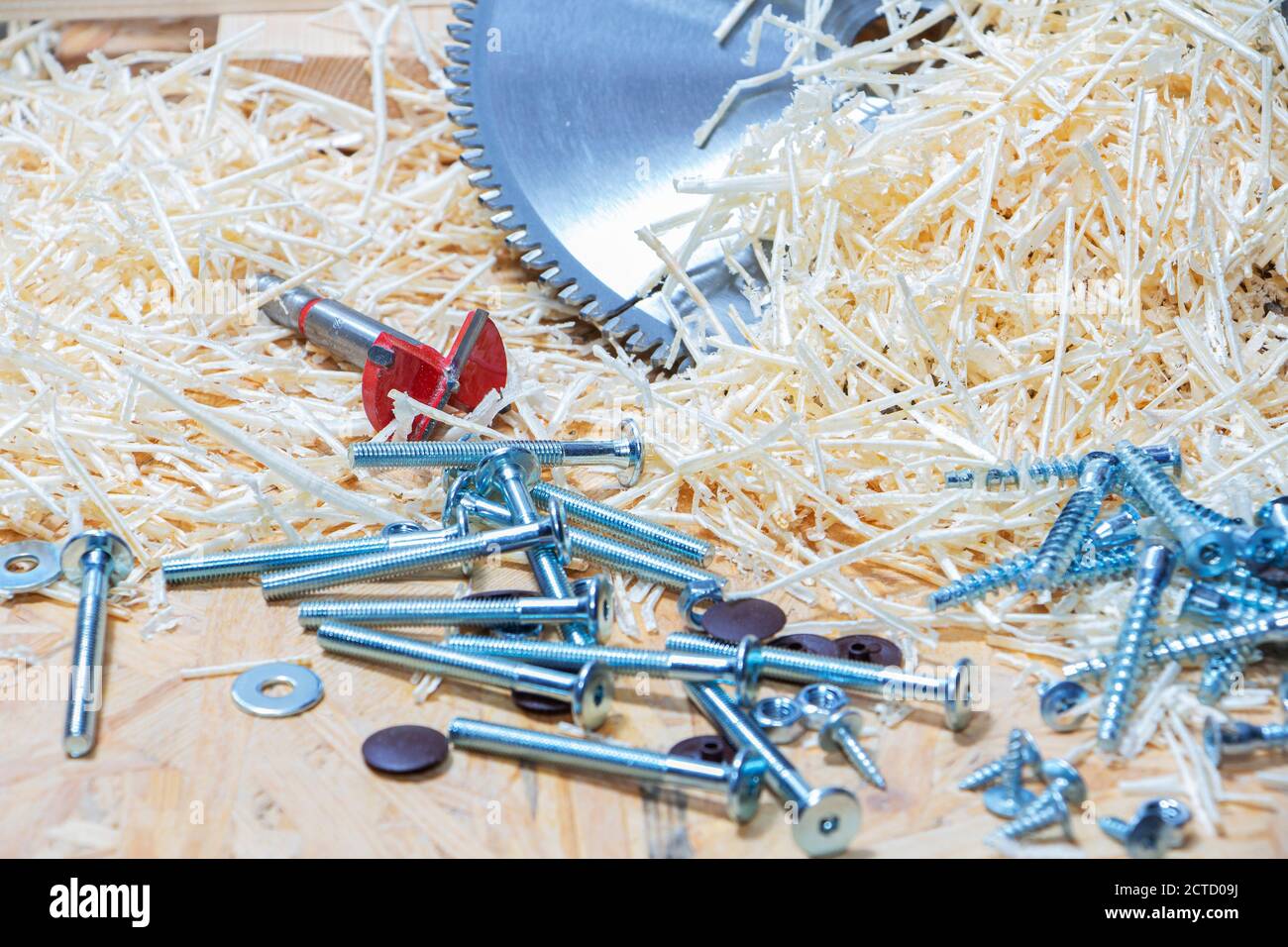 Carpenter tools on wooden table with sawdust. Circular Saw. Carpenter ...