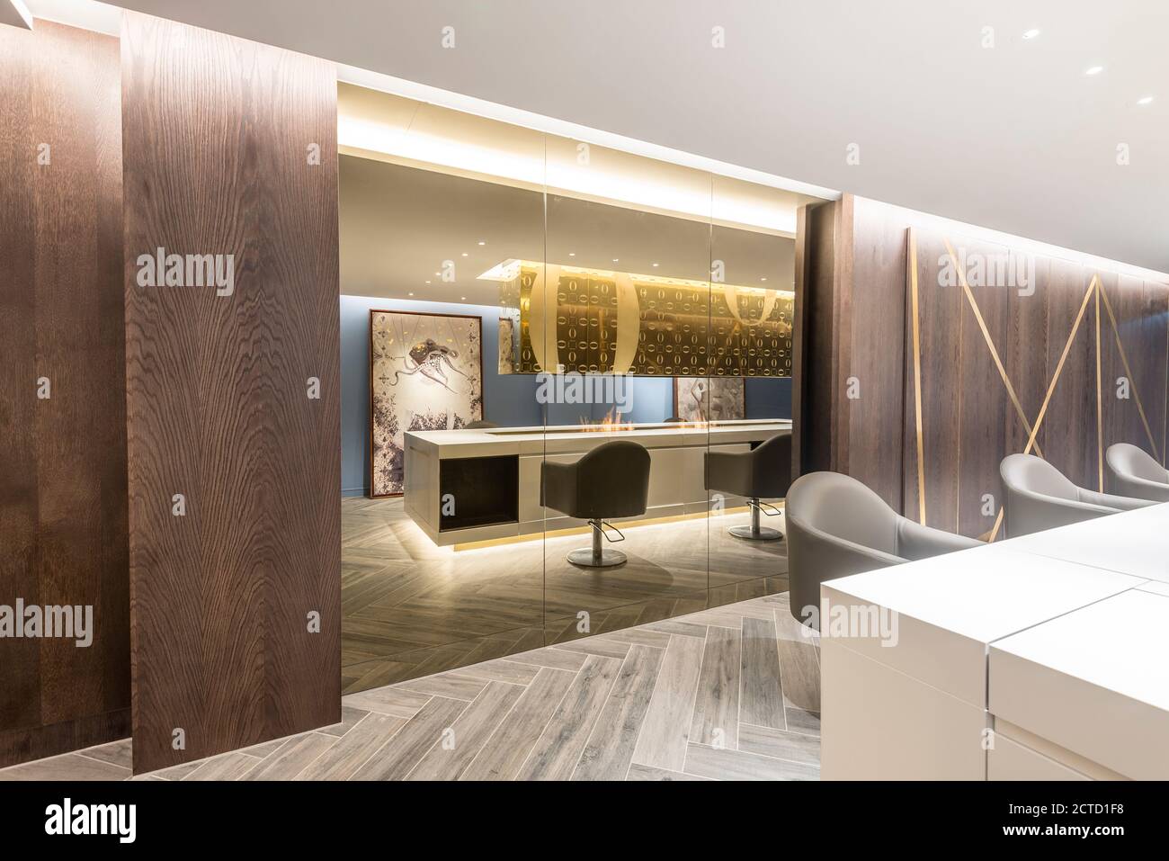 Haircut stations in a luxury hair salon between ground floor and ...