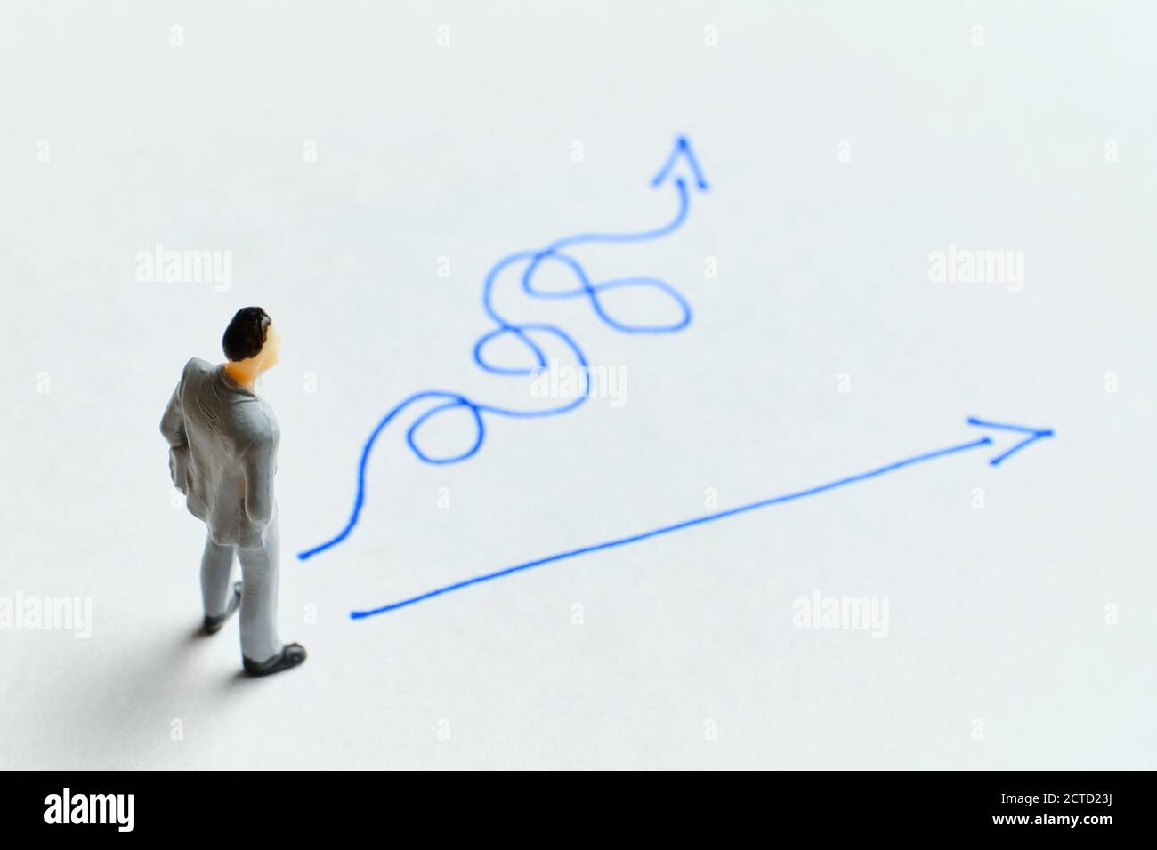 Business person concept for choosing a strategy path Stock Photo - Alamy