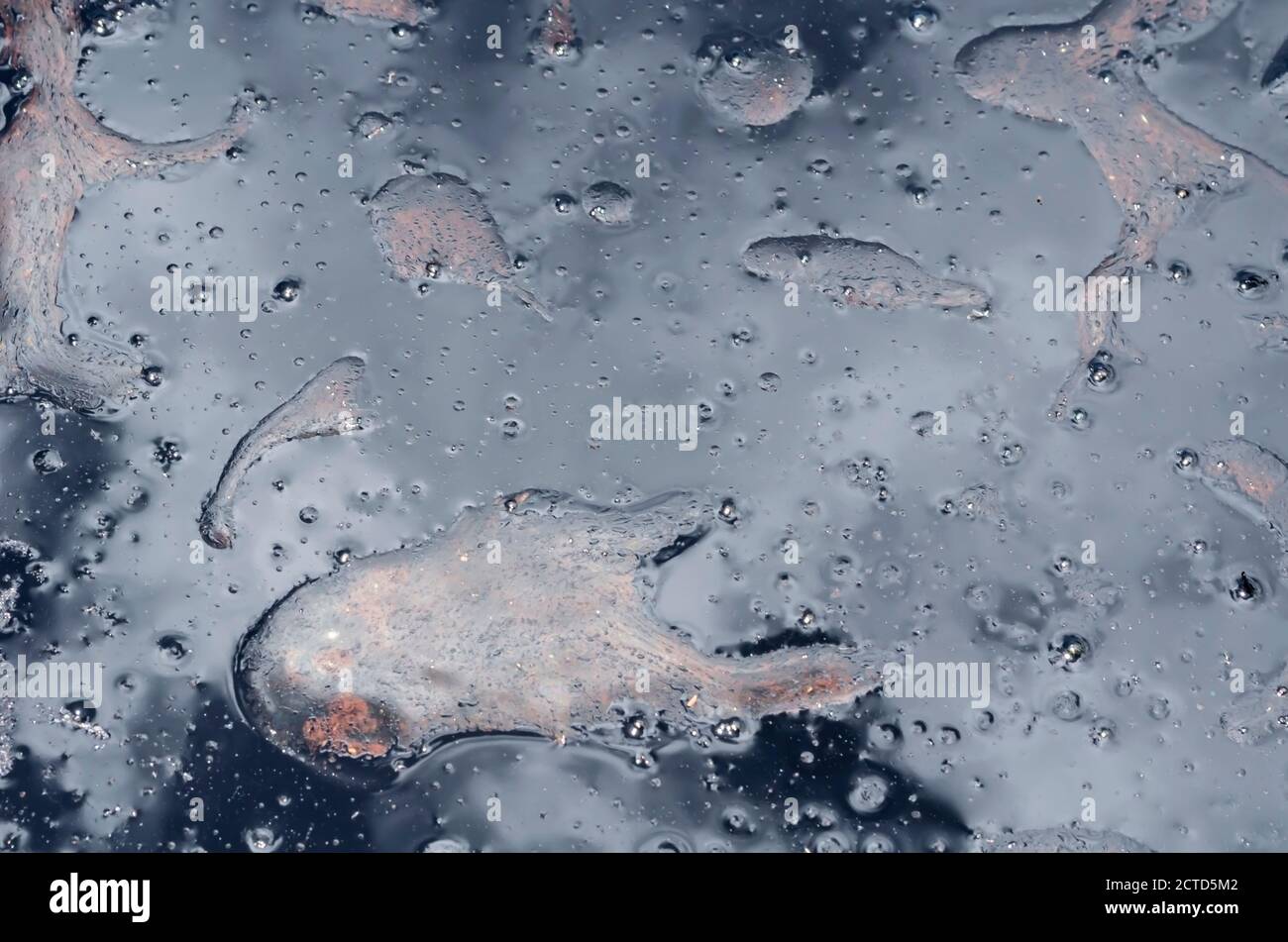 Water Mixing In With Tar Stock Photo - Alamy