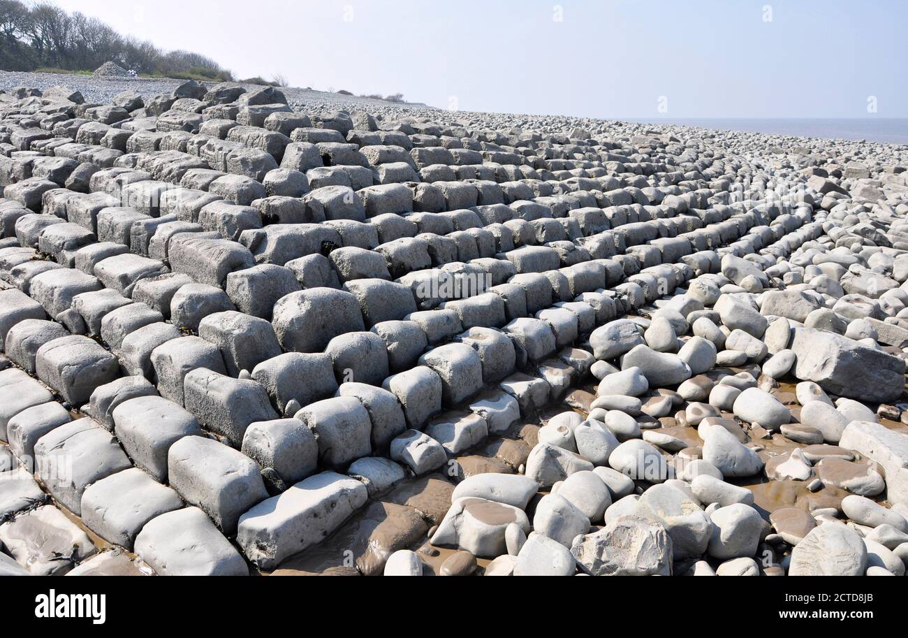 The remains of Lilstock Harbour breakwater near Kilve in Somerset Stock ...