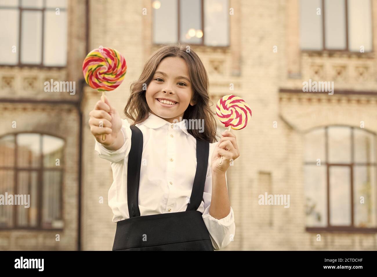 Crazy about sweets. Sugar addiction. Cheat meal day. Happy kid with ...