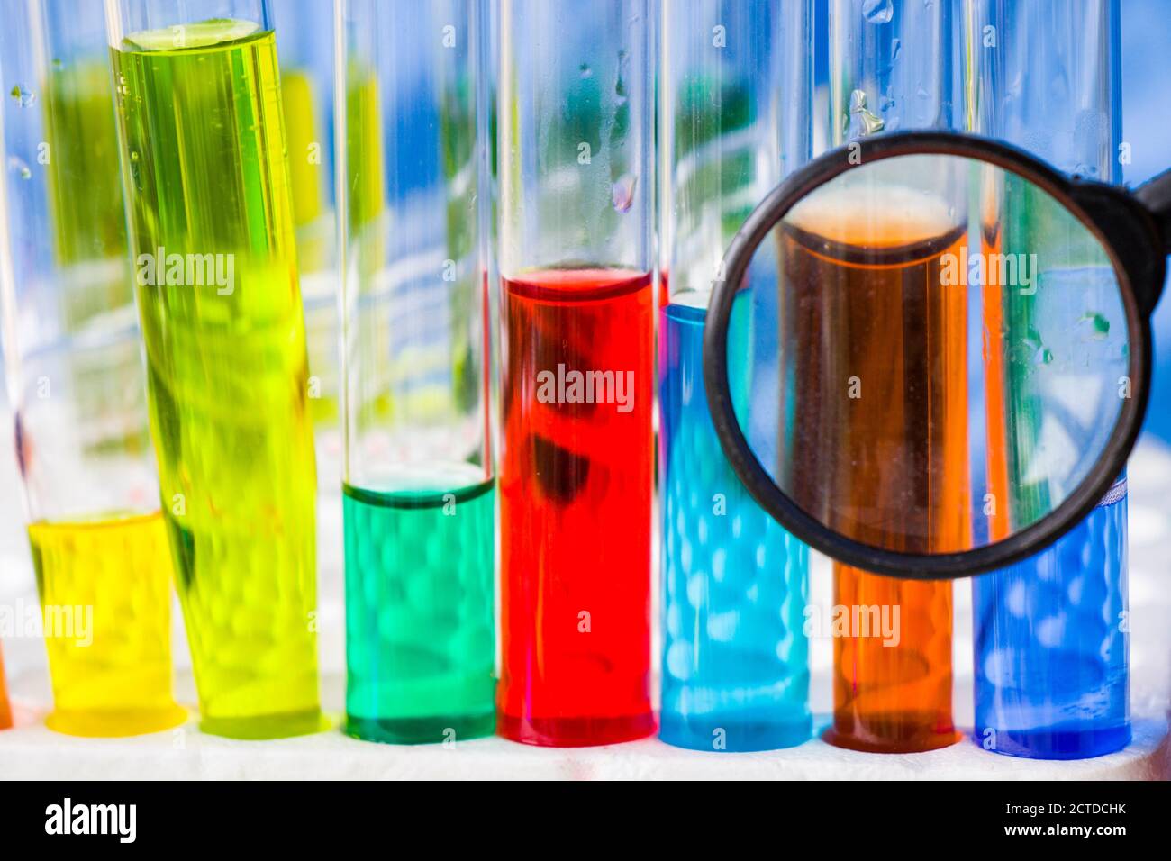 Laboratory instruments, glassware and reagents, colorful liquid ...