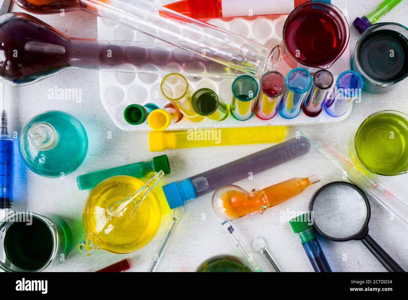 Laboratory instruments, glassware and reagents, colorful liquid ...